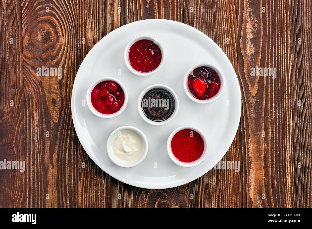 Overhead view of assortment of fruit puree. Jam, confiture, chutney or ...