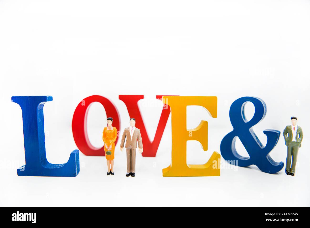 Love triangle. Abstract photo of love and lovers. Big wooden letters ...