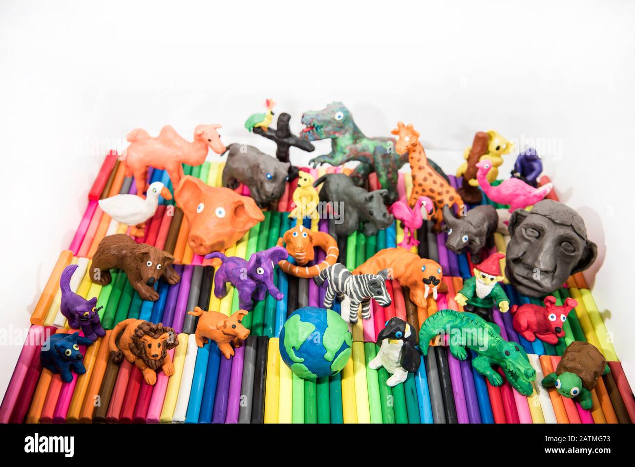 Animals made from Play Clay with Earth Planet in middle Stock Photo - Alamy