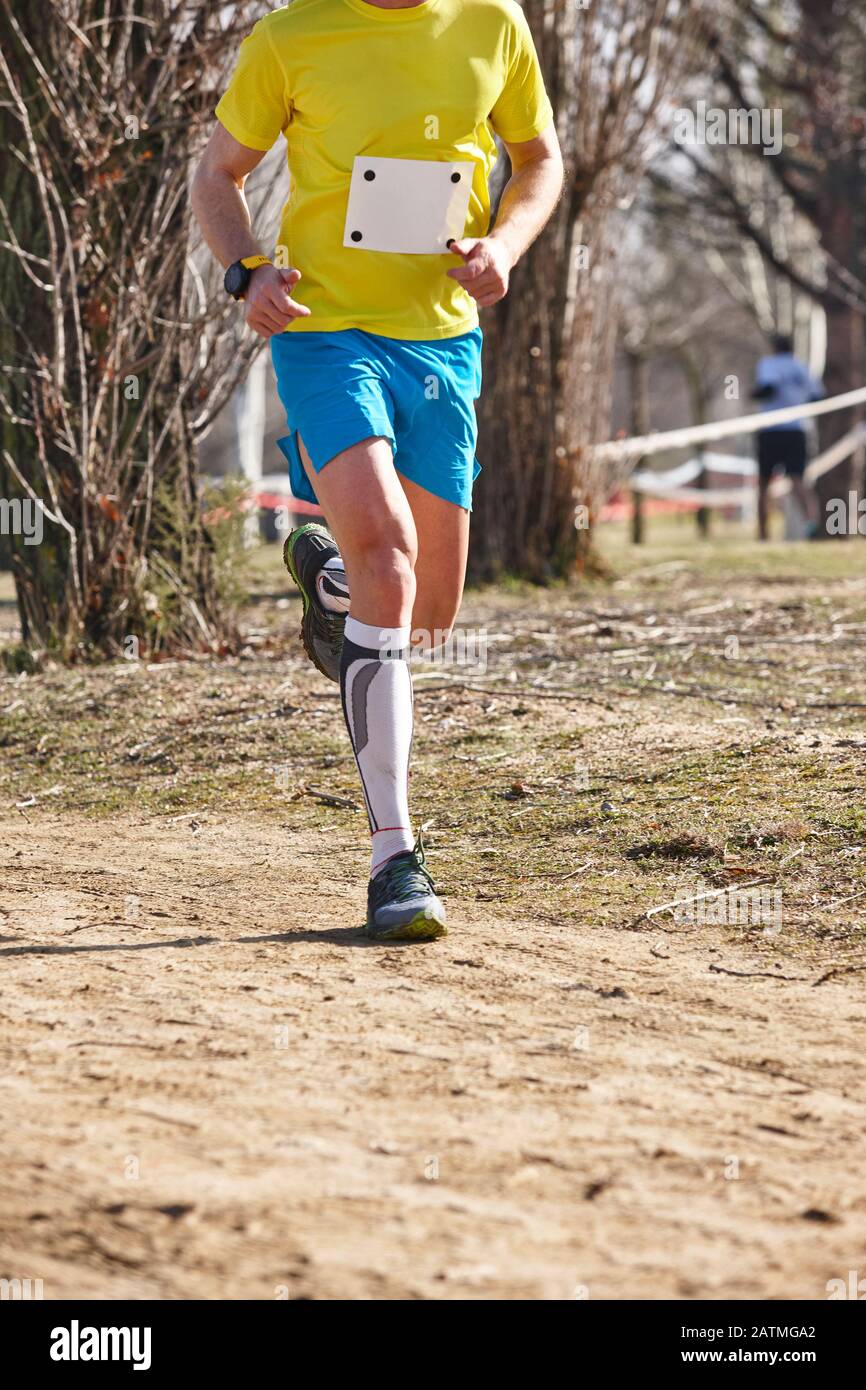 Cross country runners on a race. Active healthy outdoor lifestyle Stock ...