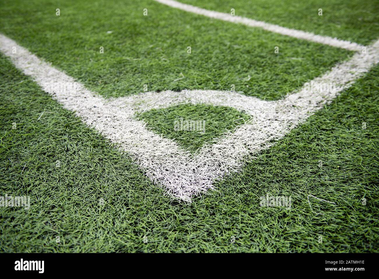 Football field corner with white marks, green artificial grass texture ...