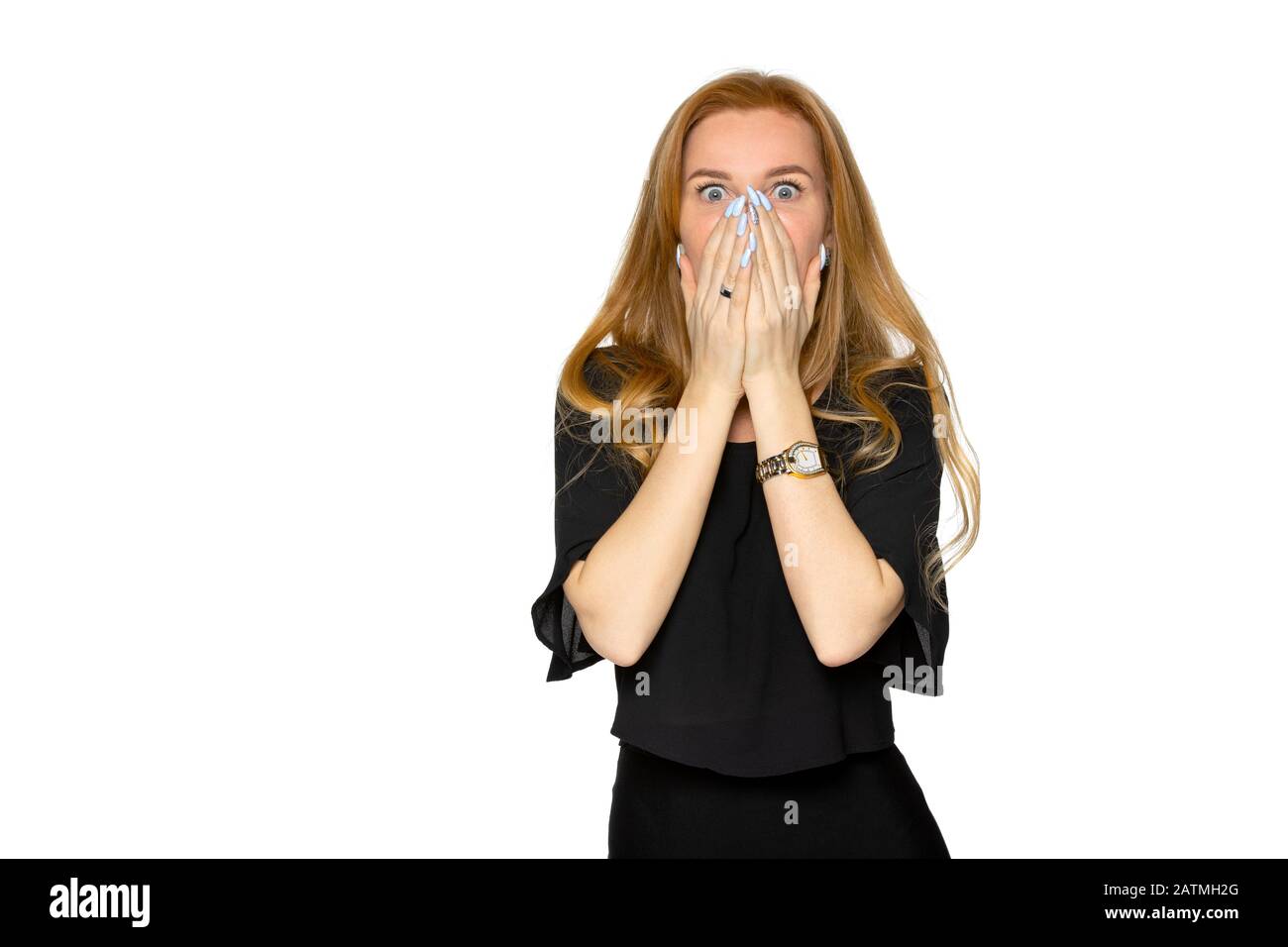 frightened young woman on an isolated white background. unexpected news ...