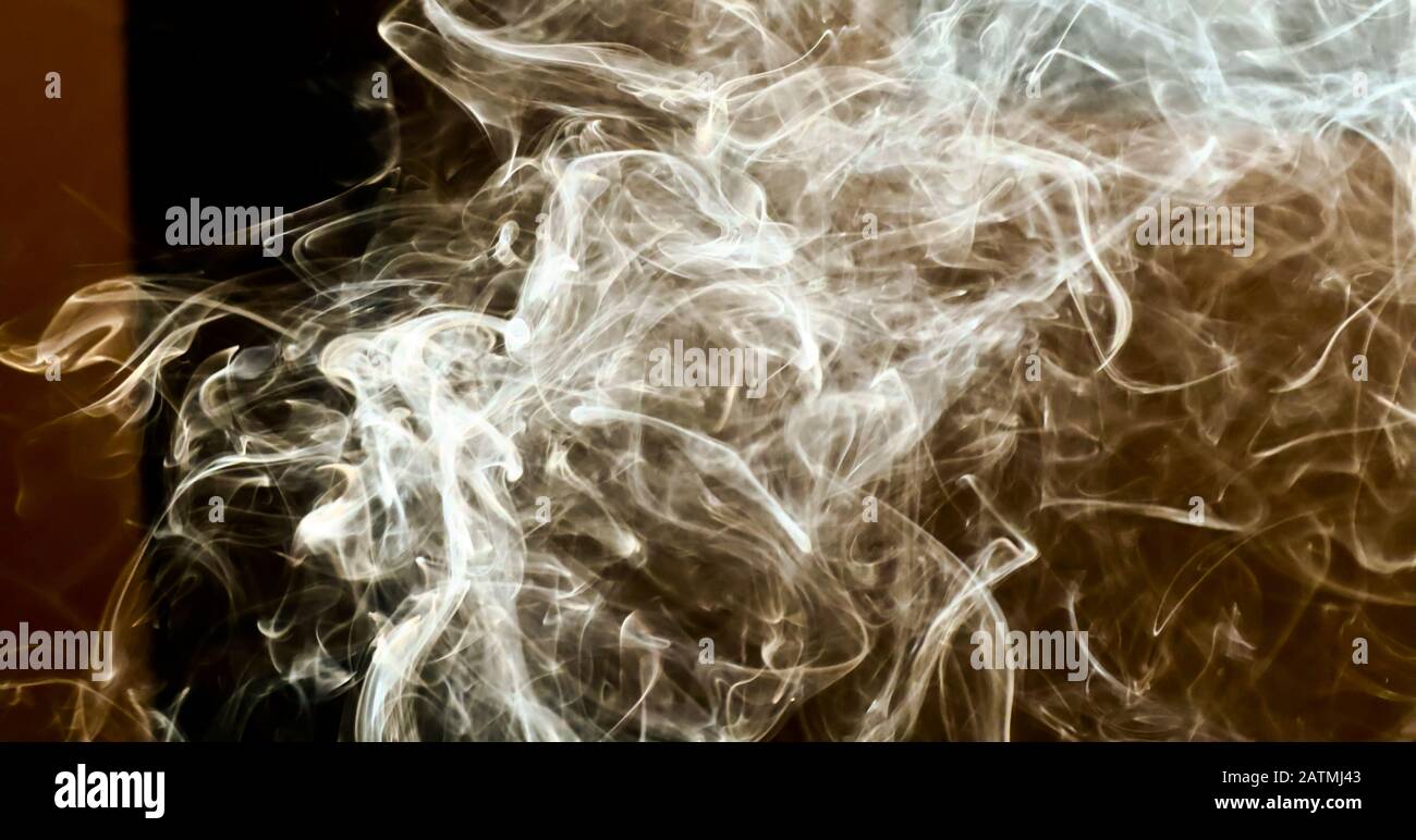 Smoke steam in room lighten by sun light, hazy steam curls for ...