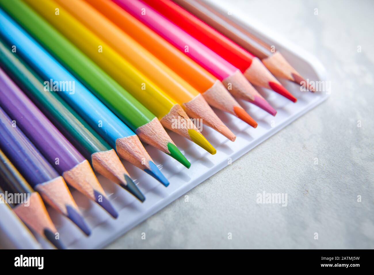 Close up. seamless colored pencils row with wave on lower side . Set of ...