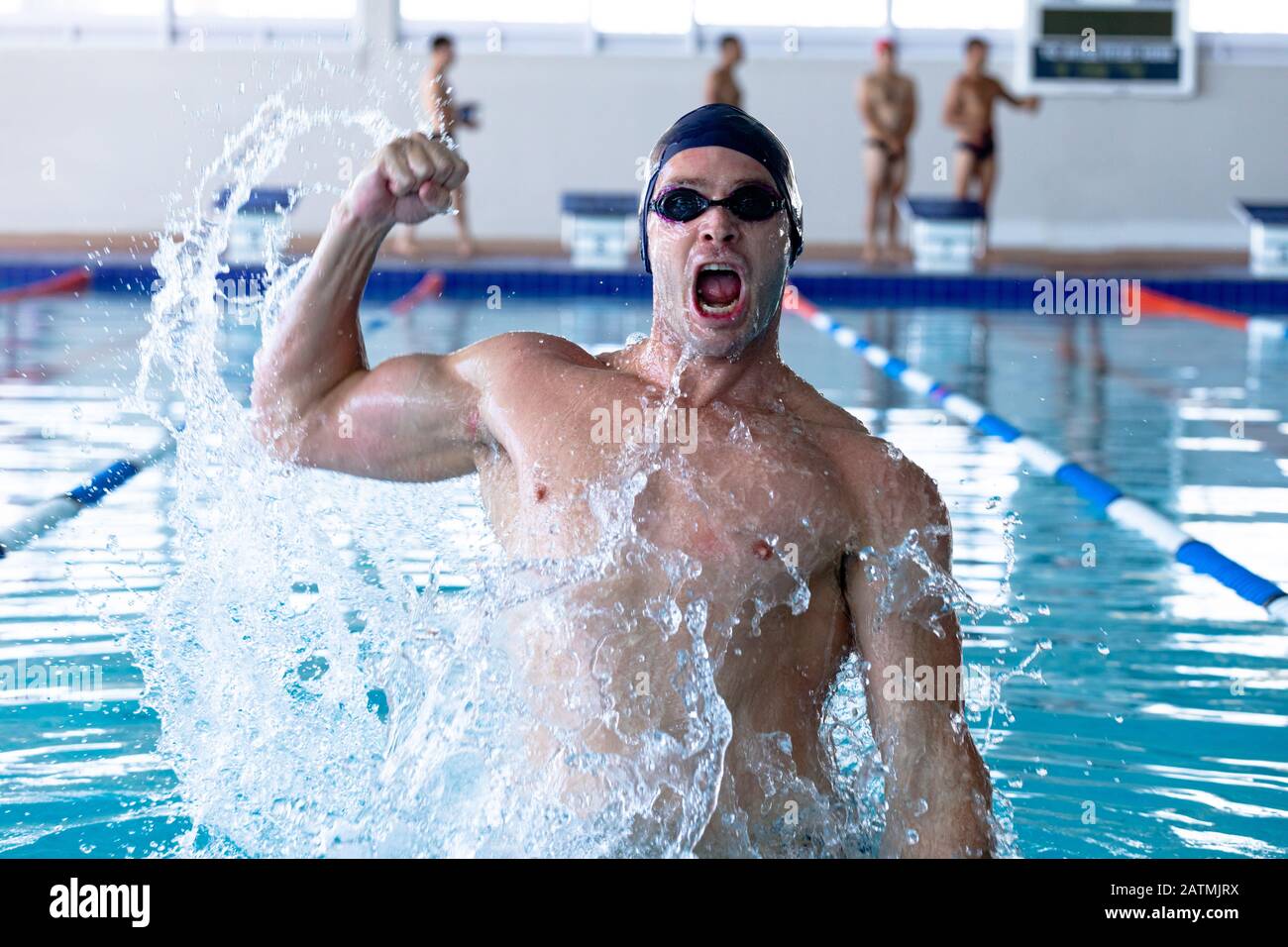 Swimmer cheering in pool hi-res stock photography and images - Alamy