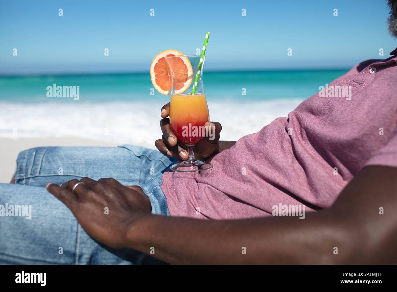 Old man relaxing at the beach Stock Photo - Alamy