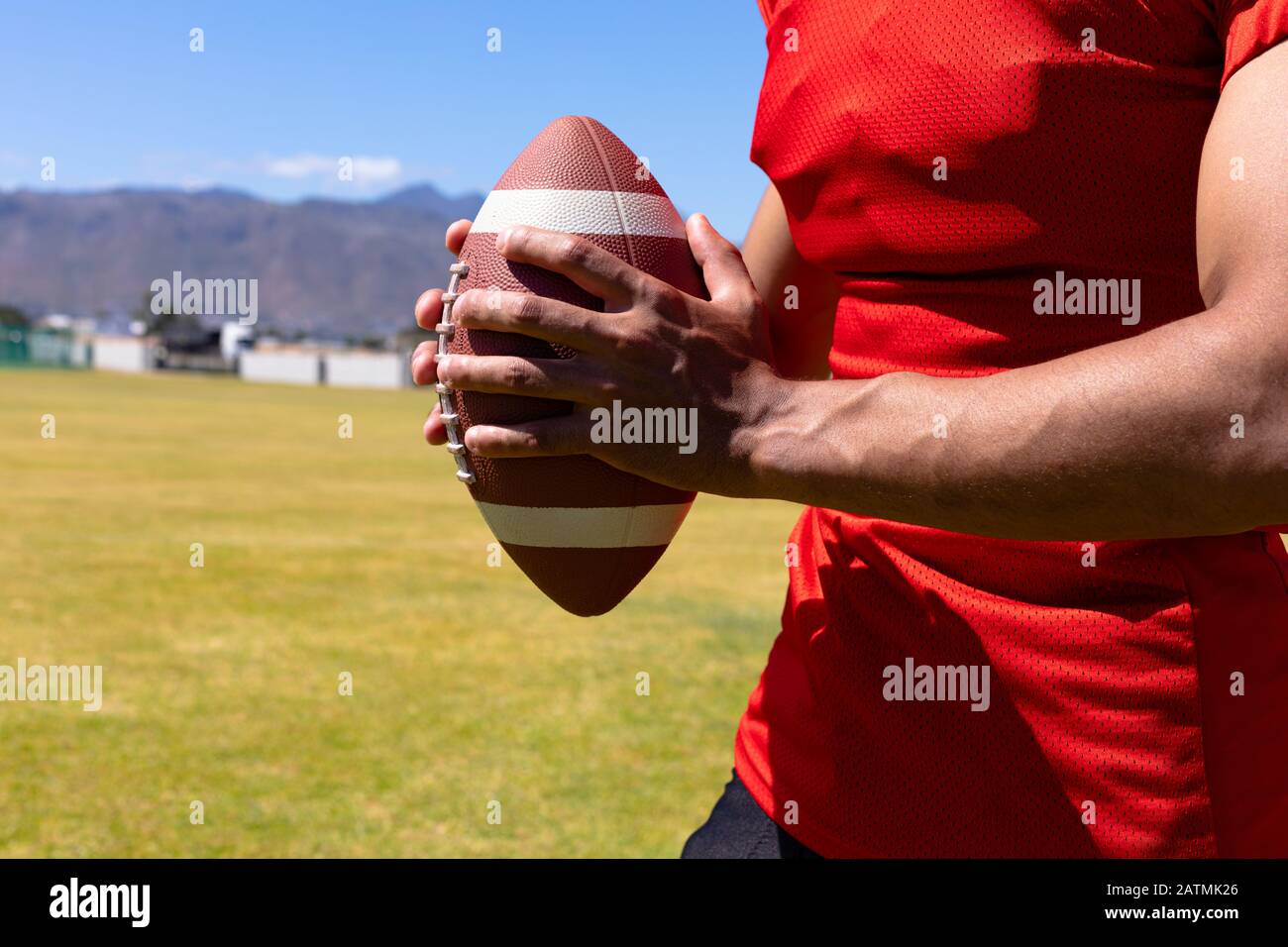 Football player with ball Stock Photo - Alamy