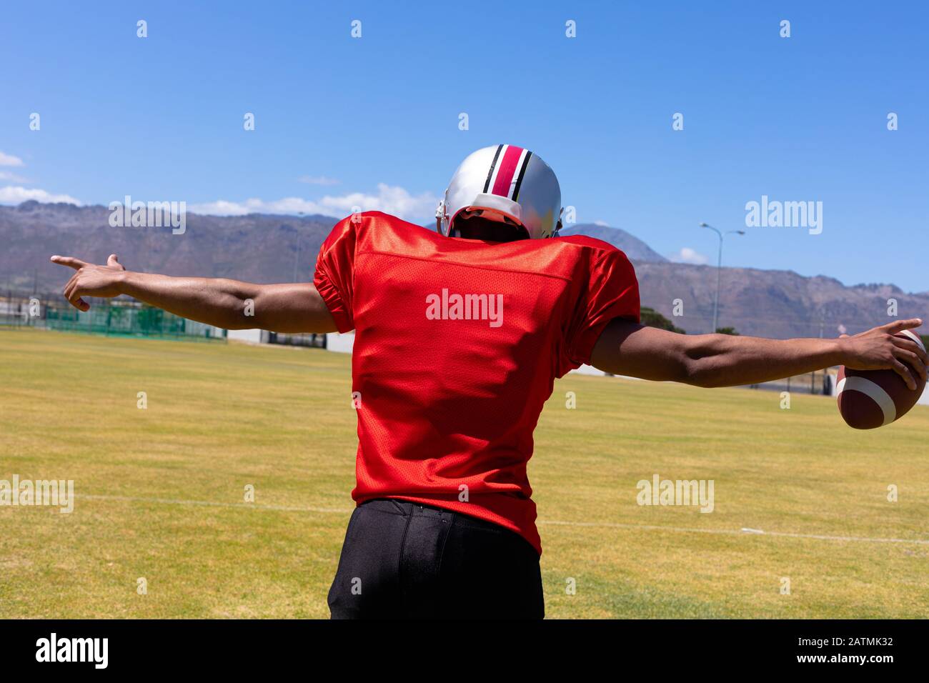 Football player with ball Stock Photo - Alamy