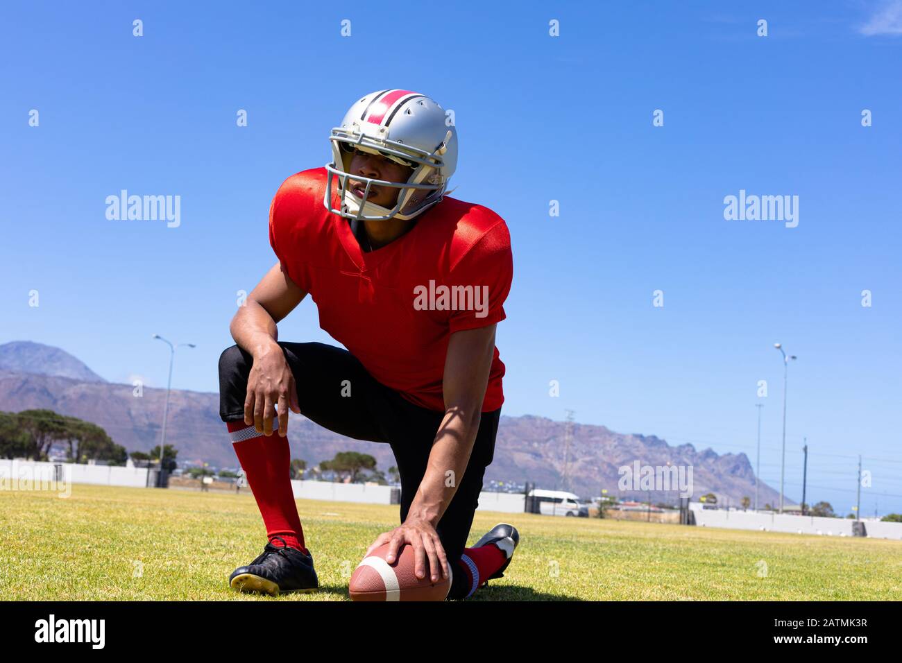 Football player with ball Stock Photo - Alamy