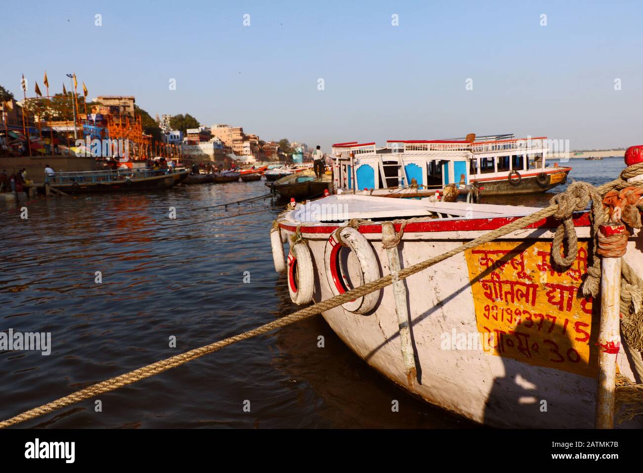 view of popular Assi Ghat with several pilgrims, that stands at the ...