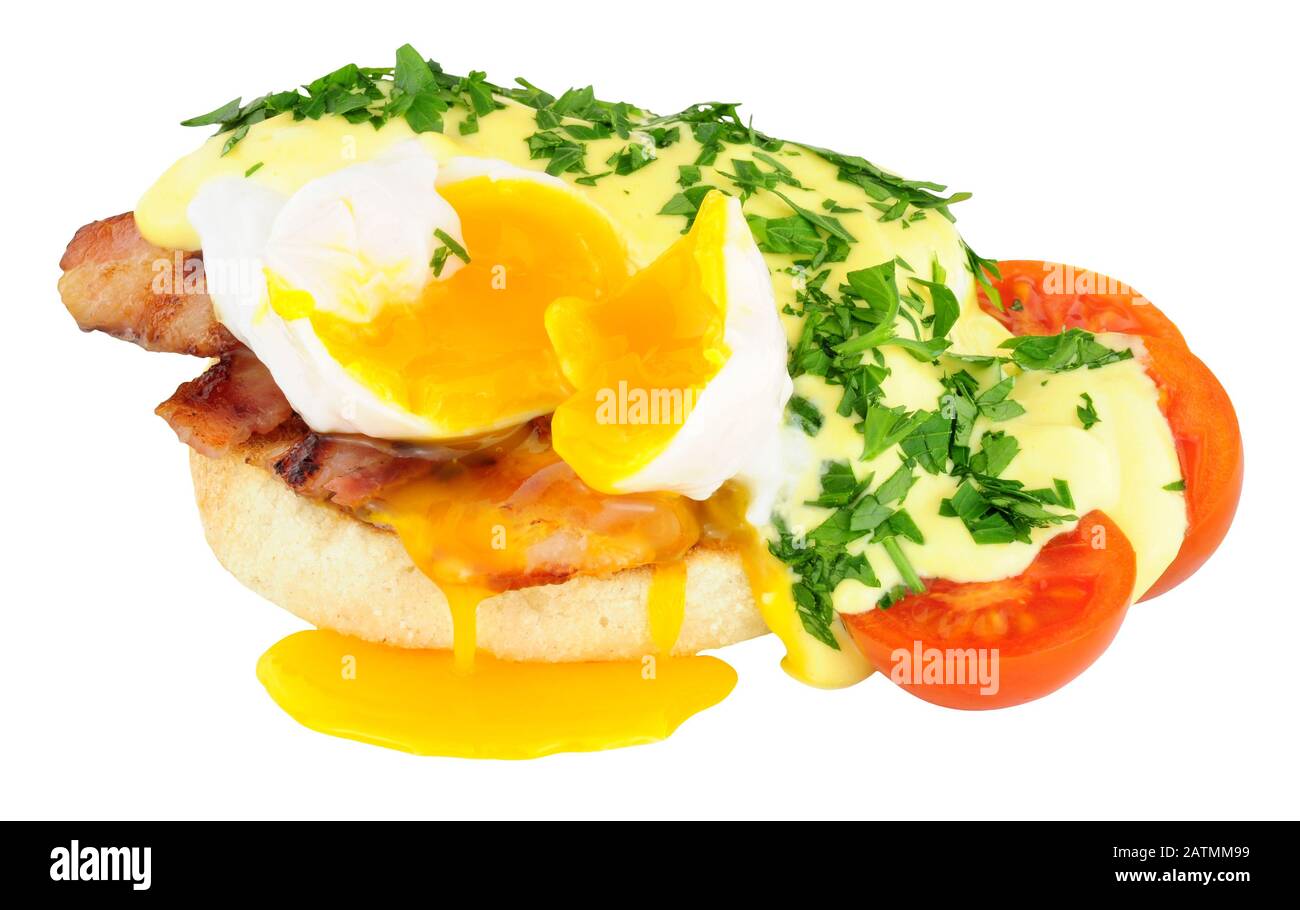 Eggs Benedict with a fresh poached egg and hollandaise sauce on an ...
