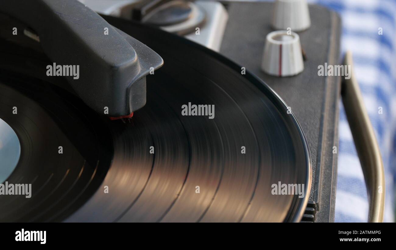 Vinyl record spinning. Close up of needle playing record album on a vintage turntable Stock ...
