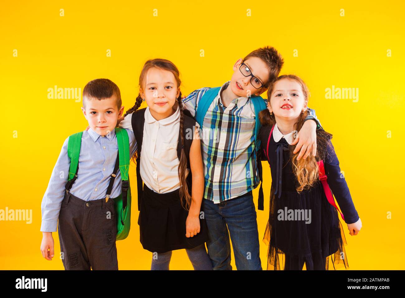 Best school friends embracing together. Happy smiling classmates ...