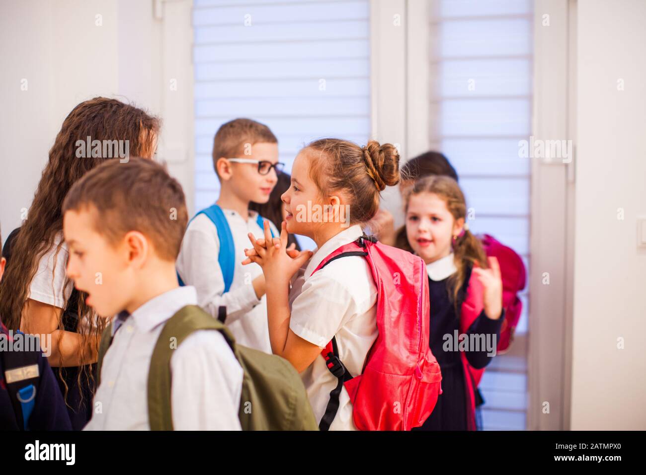 Group of school kids have a break time at school Stock Photo - Alamy