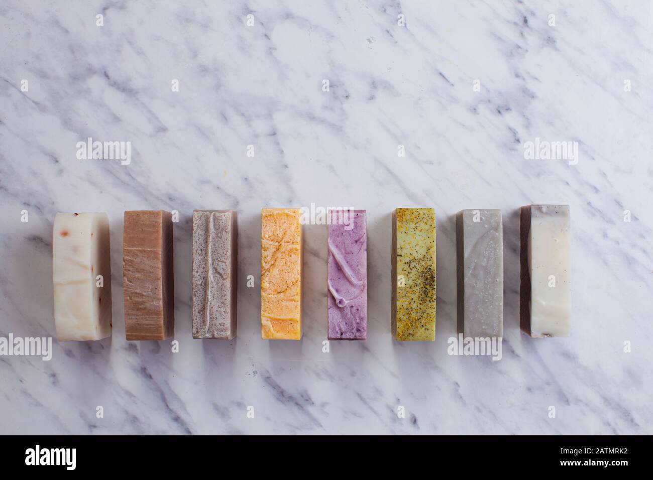 Different handmade soap bars, flat lay, top view. Eco soap and ...