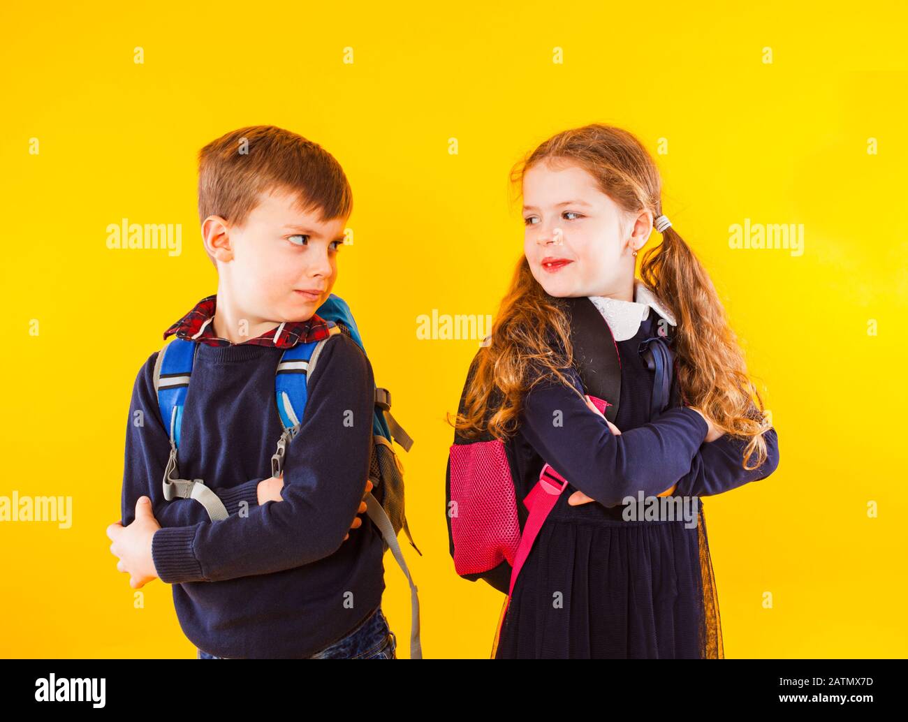 Happy kids, boy and girl, ready back to school Stock Photo - Alamy