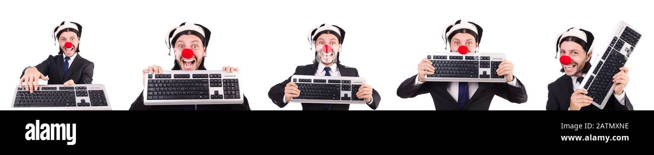 The funny clown with keyboard isolated on white Stock Photo - Alamy