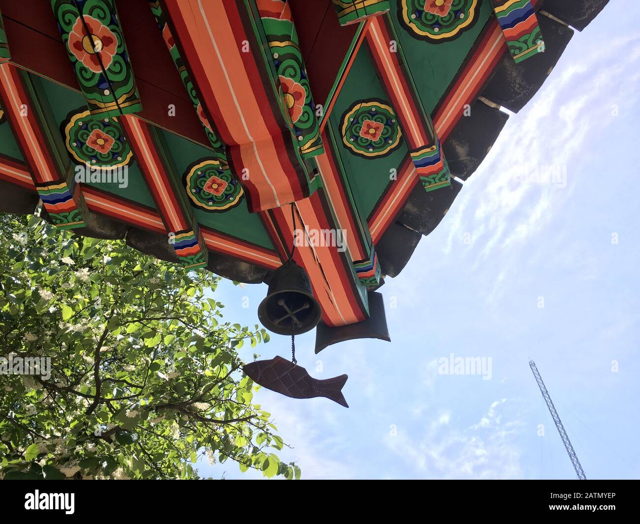Eaves and sky with temple fish in Korea Stock Photo - Alamy
