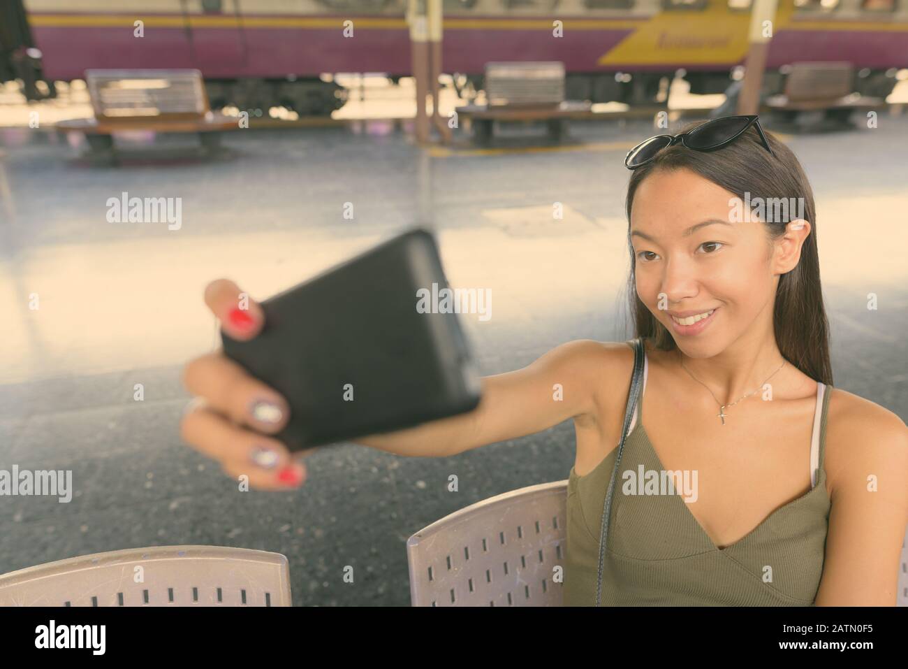 Young beautiful tourist woman vlogging with phone in the city Stock ...