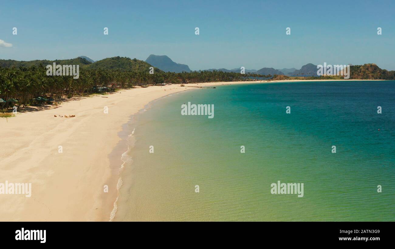 Wide sand beach Nacpan Beach, aerial view. El Nido, Palawan, Philippine ...