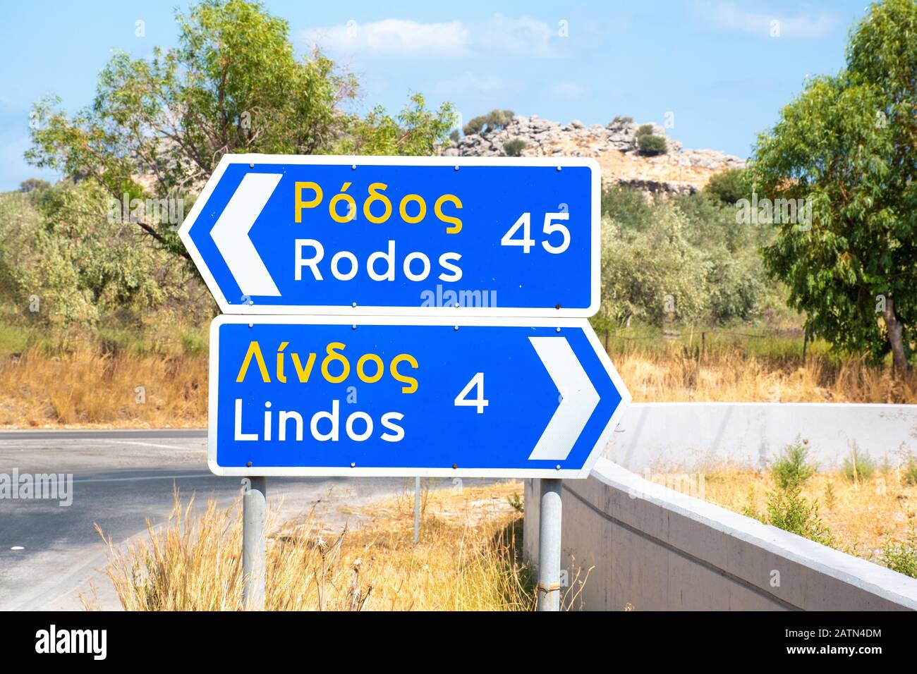 Blue traffic sign with directions to Rhodes town and Lindos (Rhodes ...