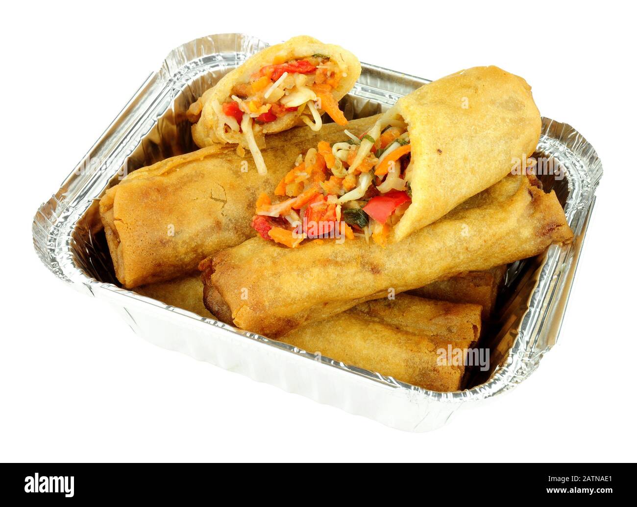 Chinese crispy vegetable filled spring rolls in an aluminium foil take ...