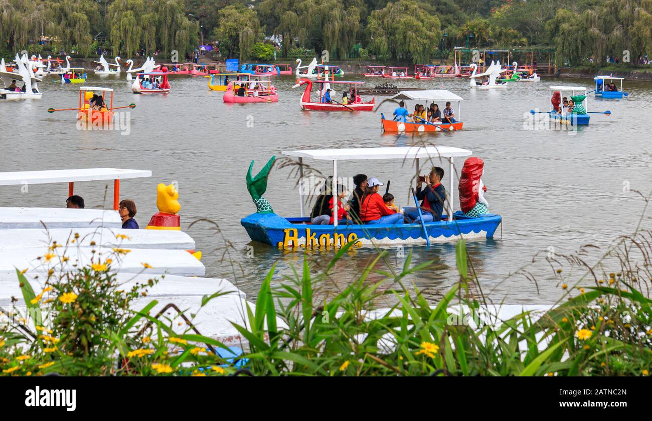 Baguio, Philippines - December 20, 2019: People Riding Boats at Burnham ...