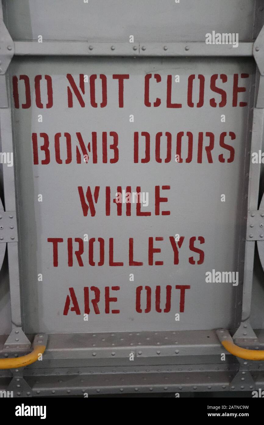 Do Not Close Bomb doors While Trolleys Are Out Sign Stock Photo - Alamy