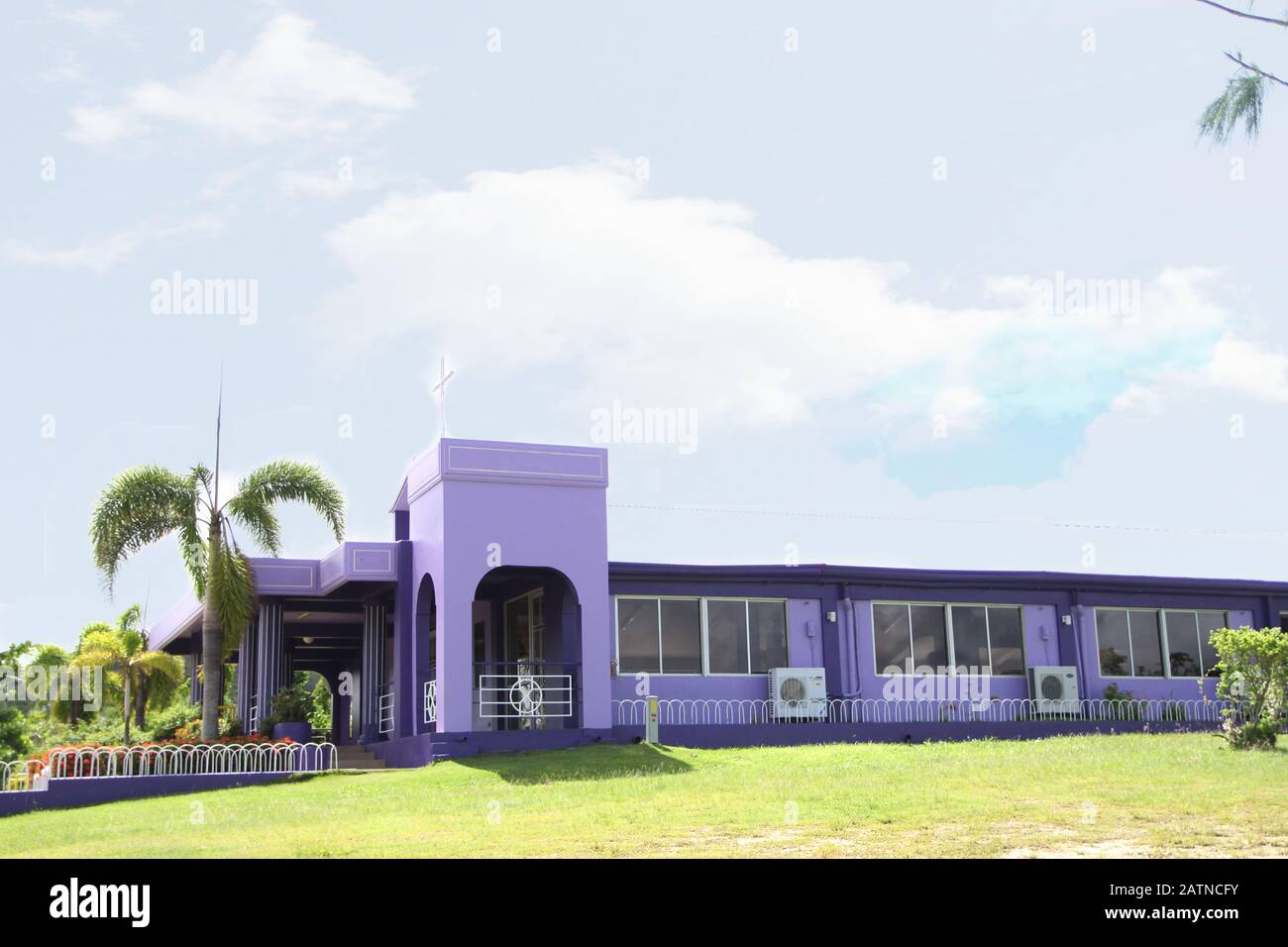 Purple-painted Catholic church in Kagman, Saipan Stock Photo - Alamy
