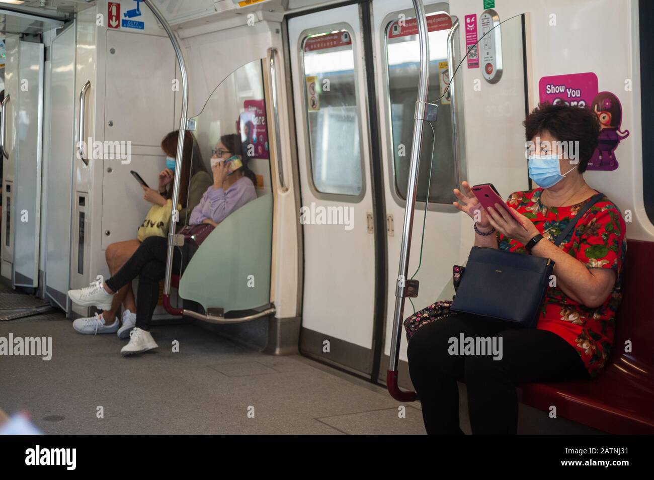 Wear mask metro hi-res stock photography and images - Alamy