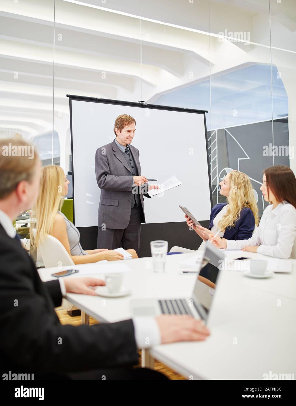 Consultant during his presentation in the business meeting in the ...