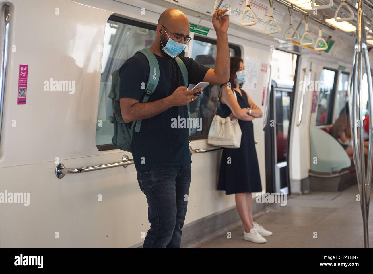31.01.2020, Singapore, Republic of Singapore, Asia - Passengers on a ...
