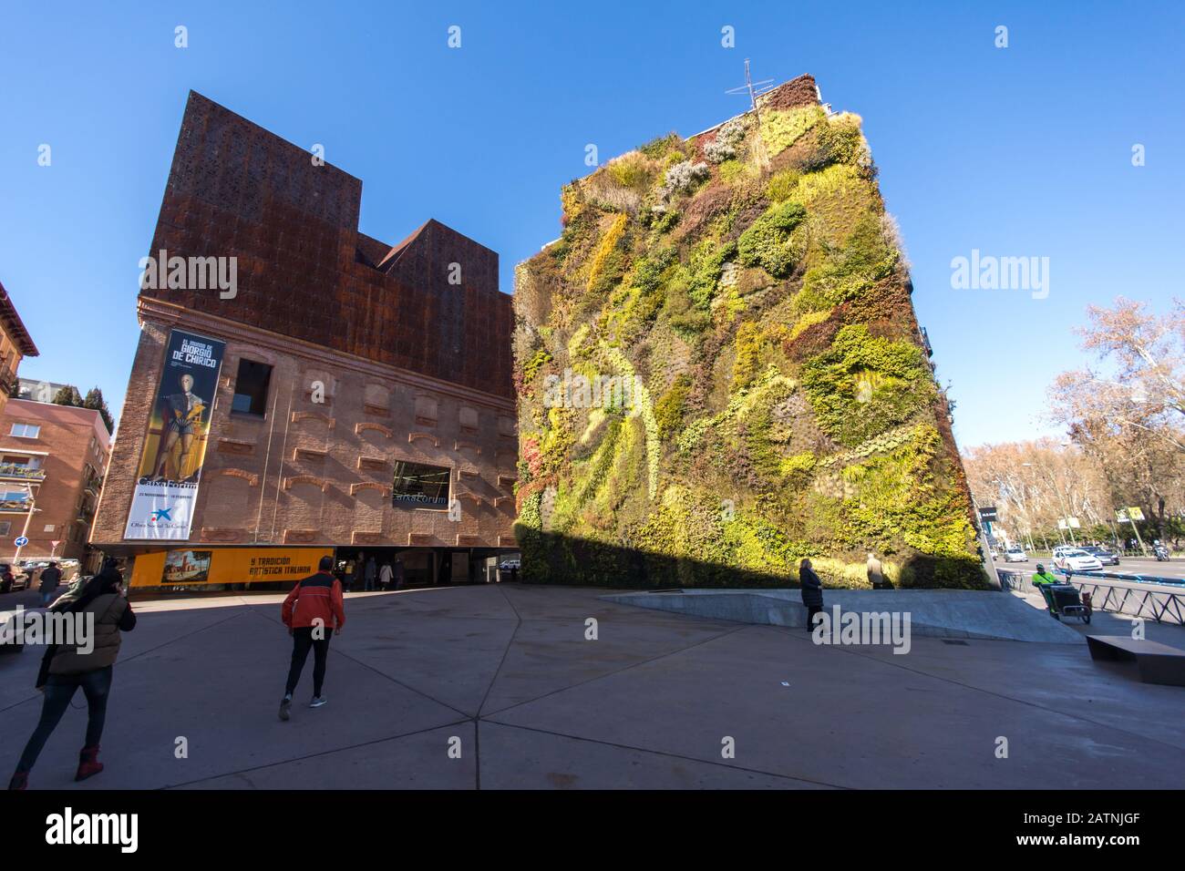 MADRID, SPAIN - JANUARY 22, 2018: Vertical garden wall and CaixaForum ...