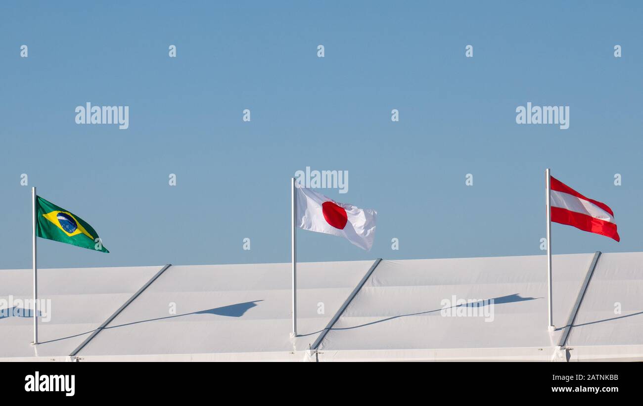 Brazilian Japanese and Austrian flags Stock Photo - Alamy