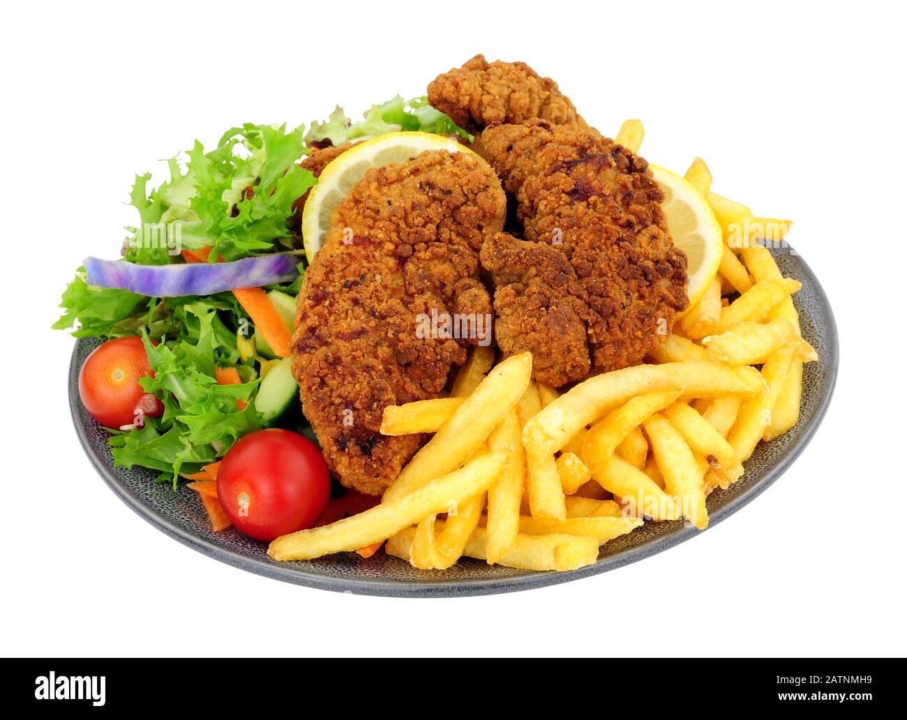 Southern fried chicken and French fries meal with fresh salad isolated ...