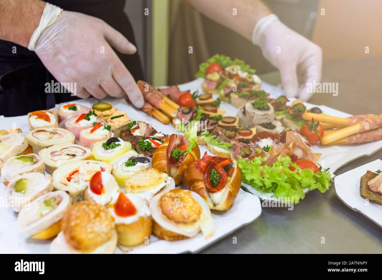 Preparing appetizers hi-res stock photography and images - Alamy