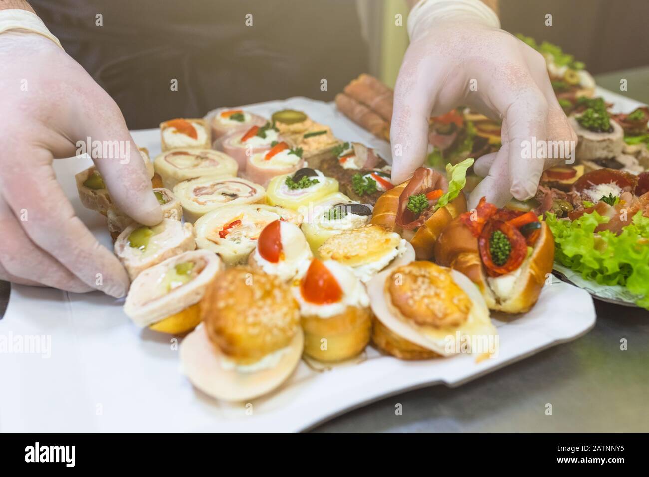 Buffet meal preparation and serving at restaurant Stock Photo - Alamy