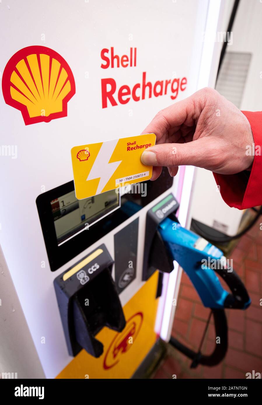 04 February 2020, Hamburg: An employee activates the charging process ...