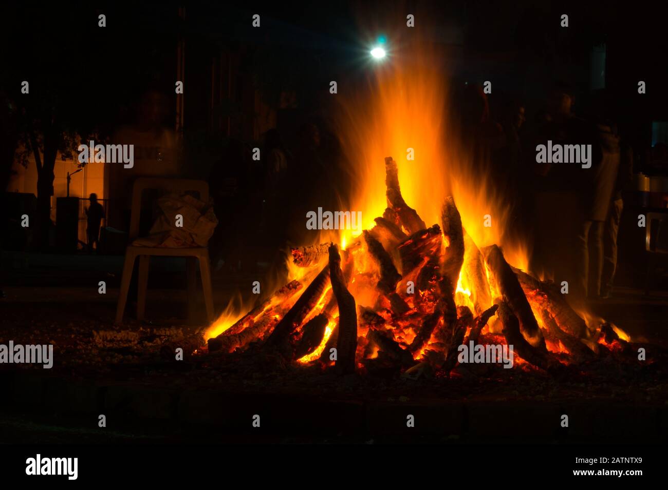 Giant bonfire lit auspicious festival hi-res stock photography and ...