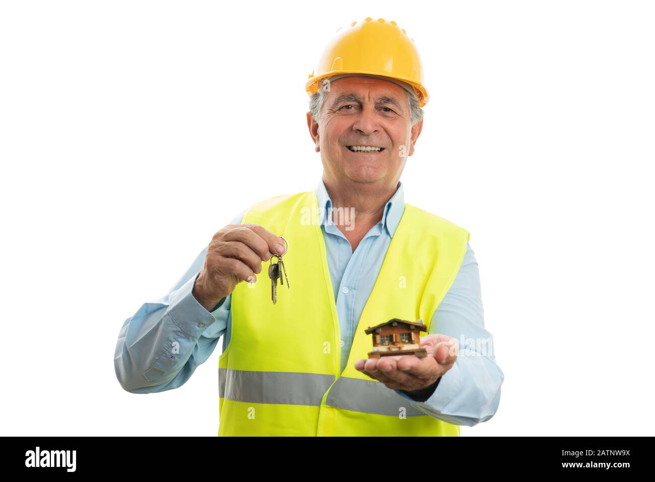 Old male builder with trustworthy expression holding small wooden house ...