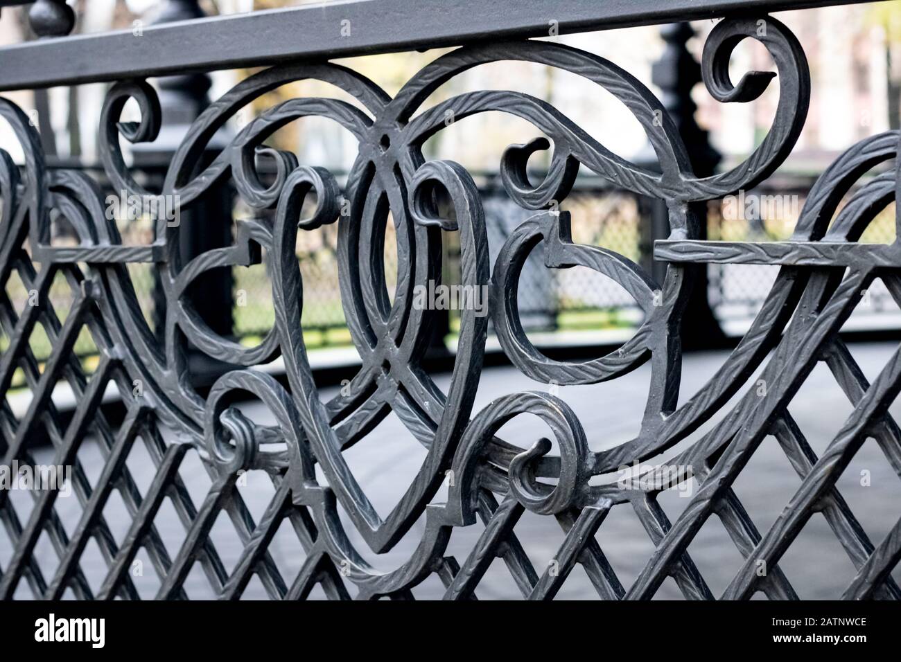 Forged patterns on the fence, decoration for the garden and yard Stock ...