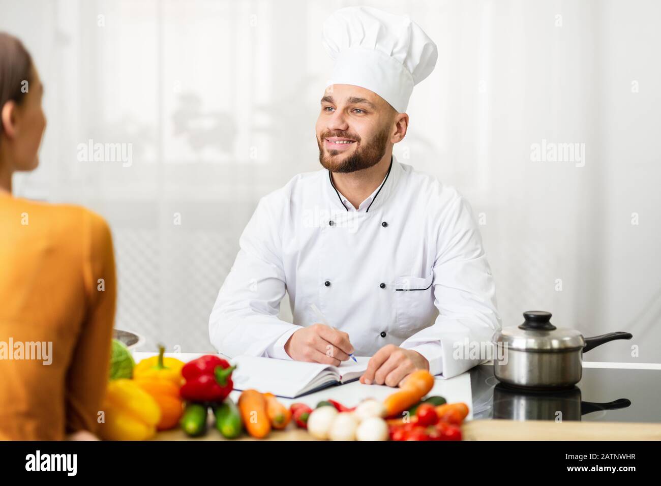 Professional Chef Man On Job Interview Talking With Woman In Kitchen ...