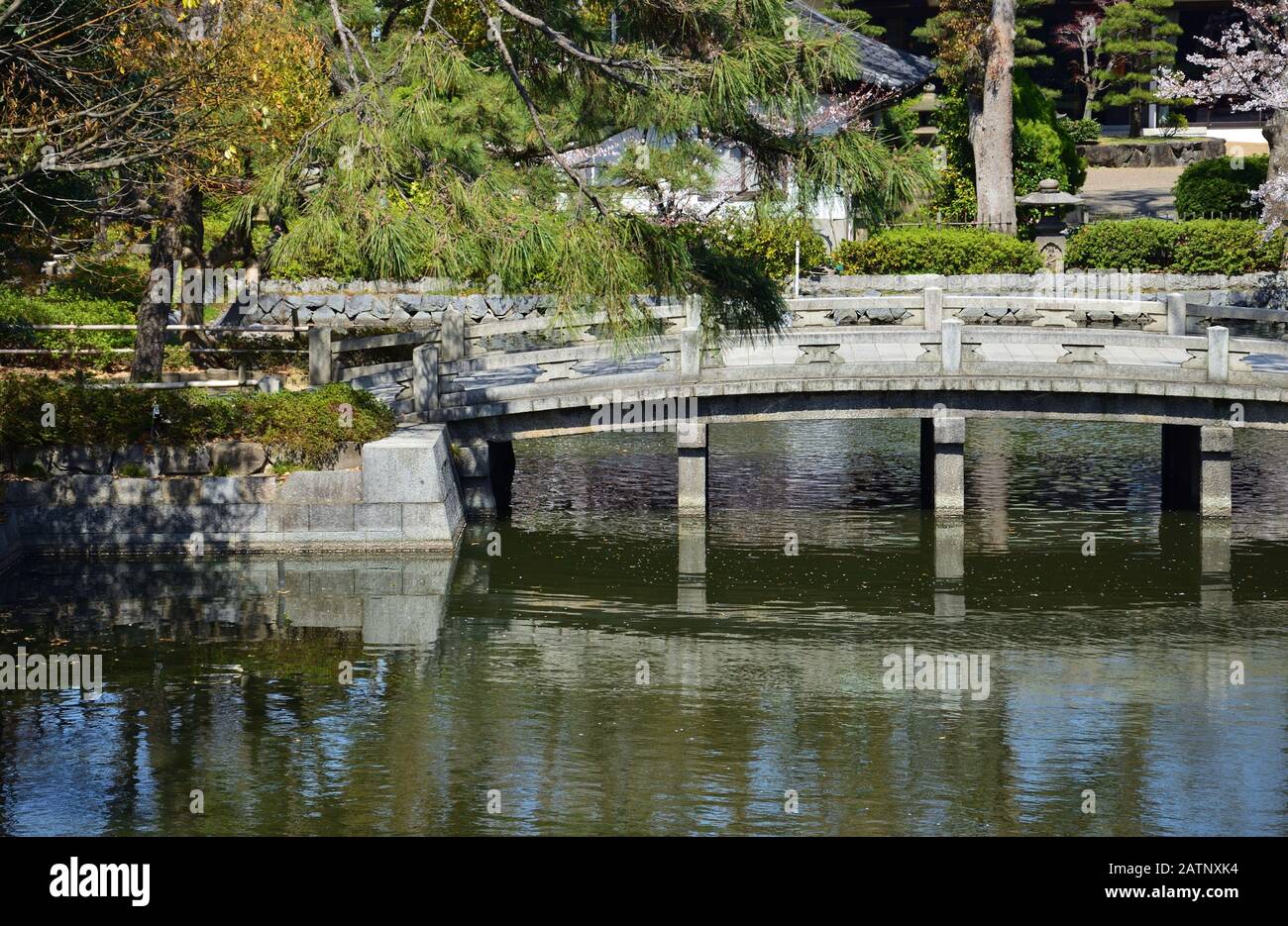 Bridge small pond garden hi-res stock photography and images - Alamy