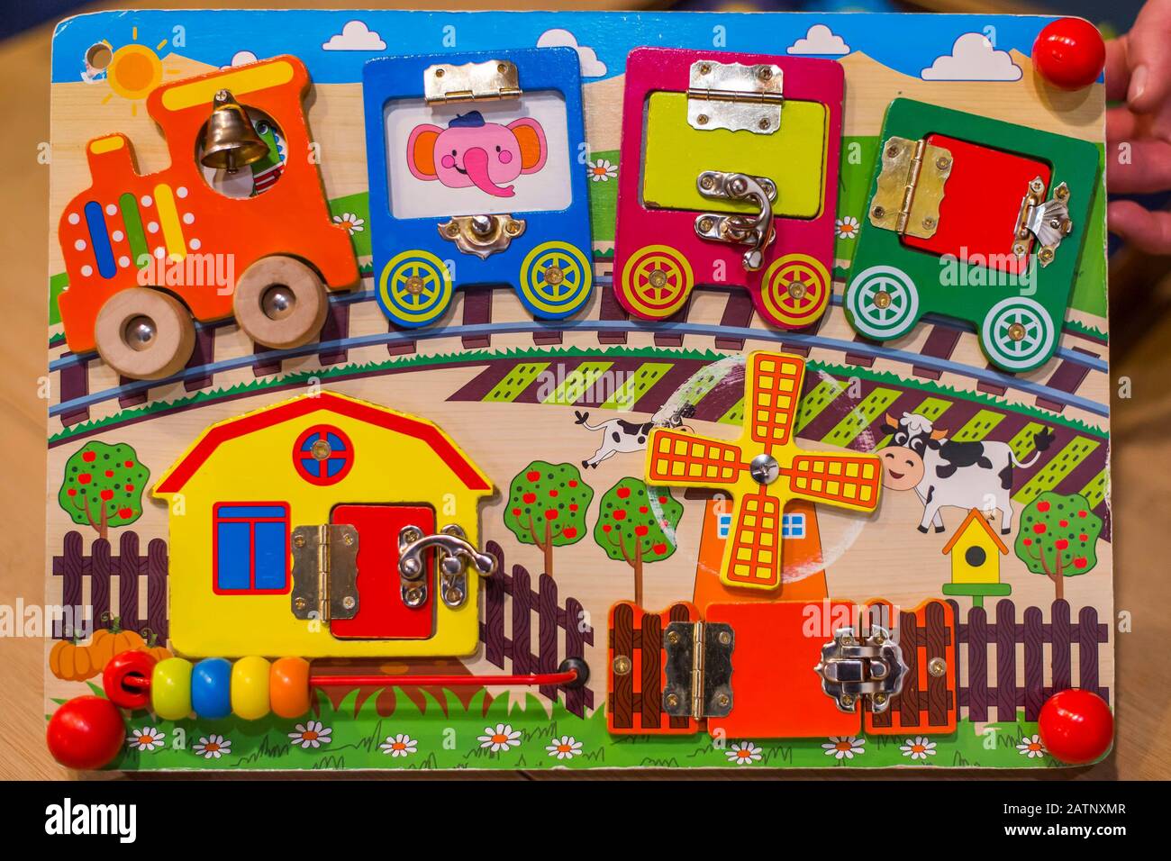 Manipulation table for children for playing Stock Photo - Alamy