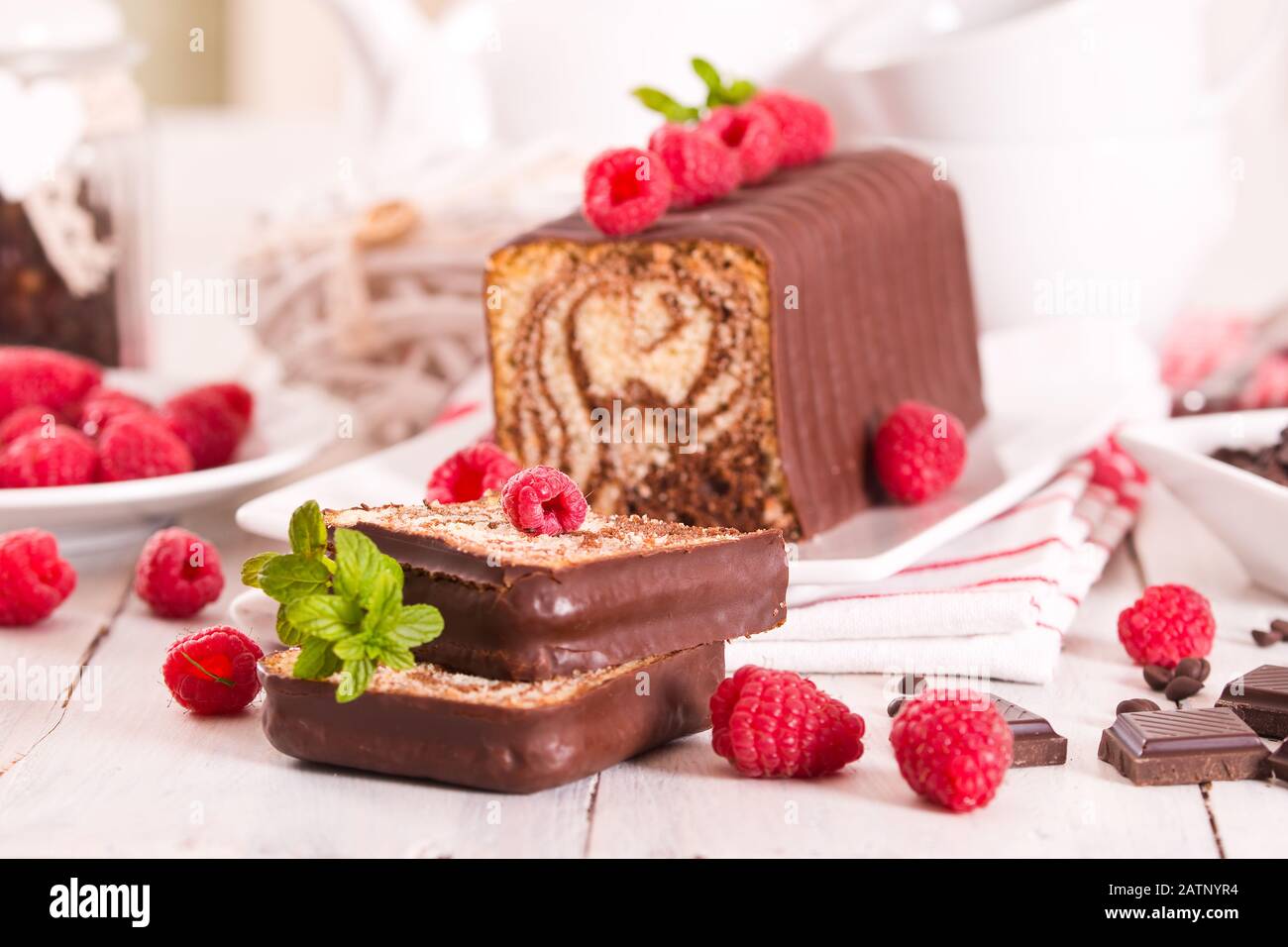 Marble cake with raspberries Stock Photo - Alamy