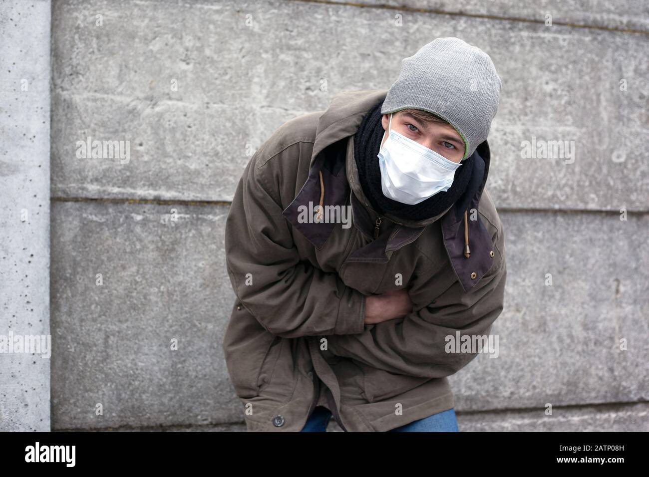 the person in the medical face mask became ill. abdominal pain with ...