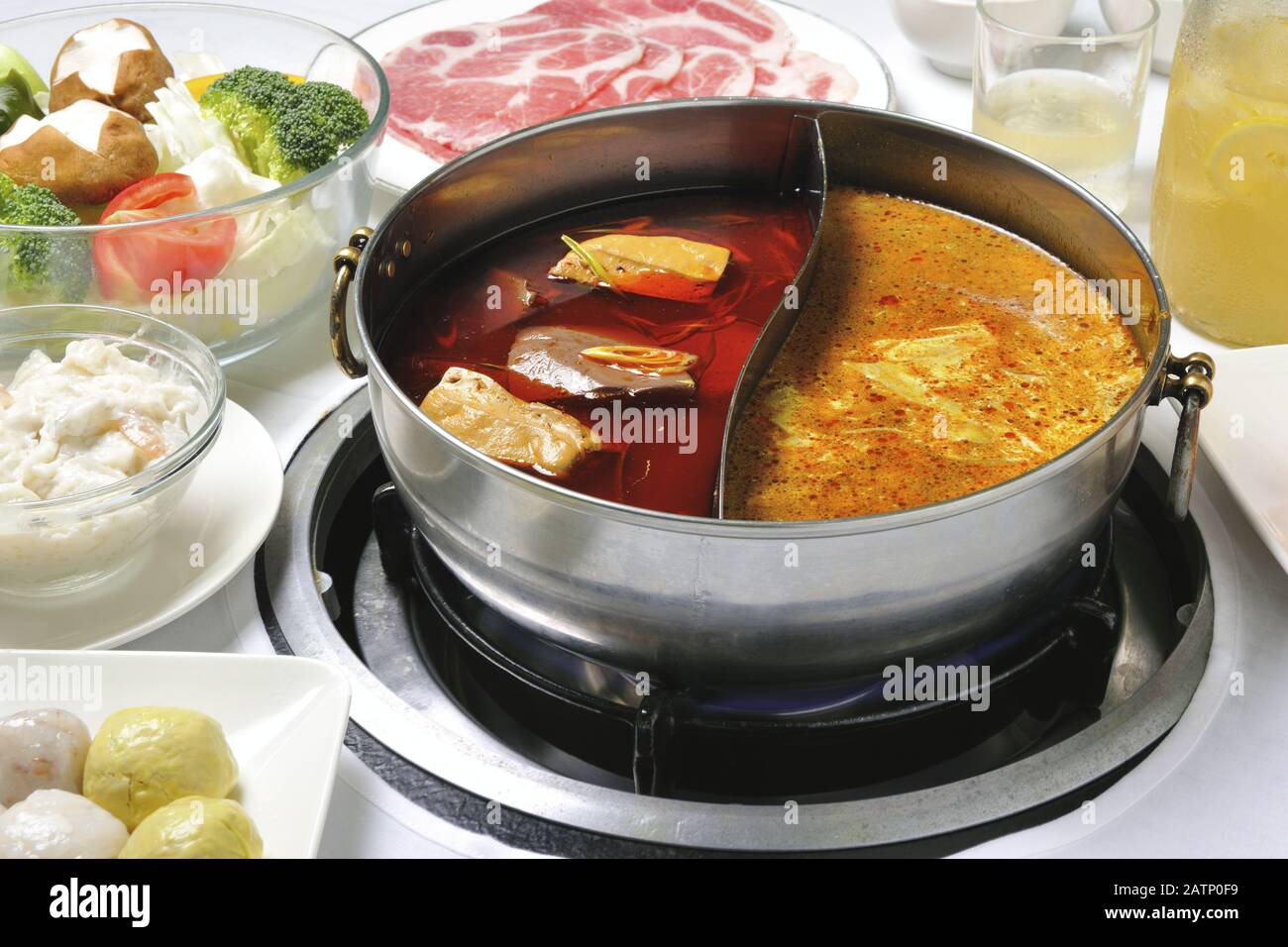 The portrait of food twin side hot pot Stock Photo - Alamy