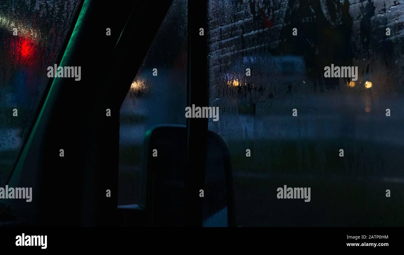 Side window of a car at night with raindrops close up Stock Photo - Alamy