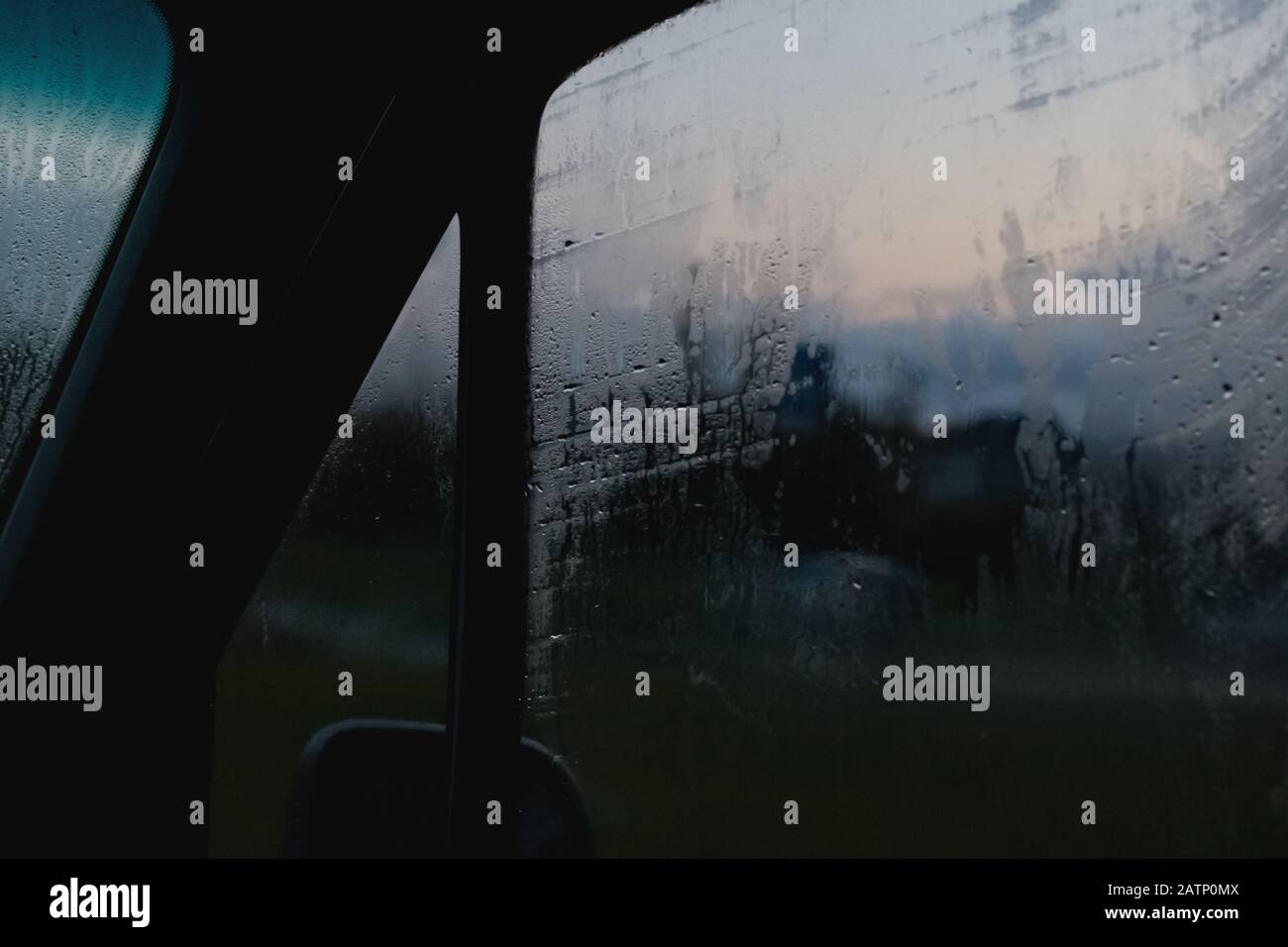 Side window of a car at night with raindrops close up Stock Photo - Alamy