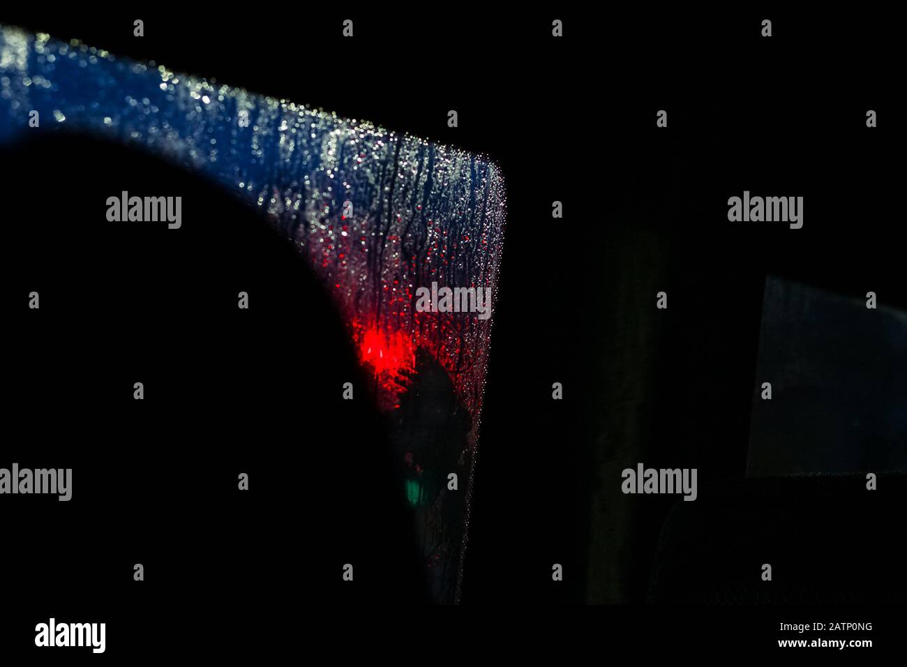 Side window of a car at night with raindrops close up Stock Photo - Alamy